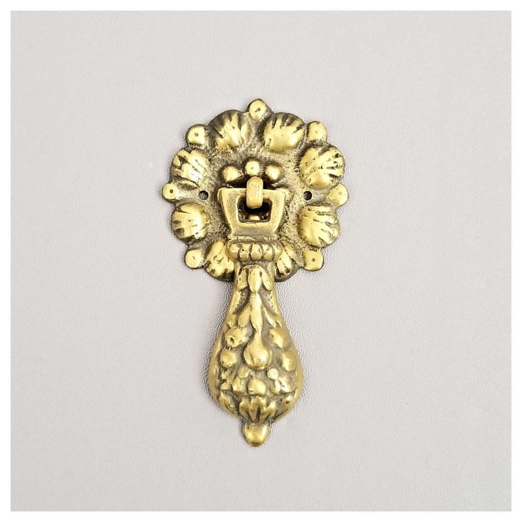 Brass fish tail, pear drop and teardrop handles, drawer pulls