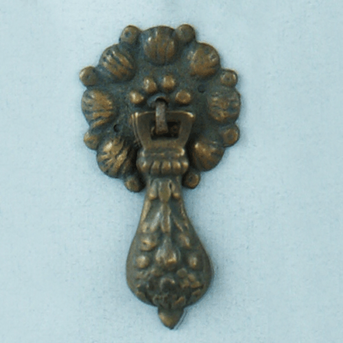 Brass fish tail, pear drop and teardrop handles, drawer pulls