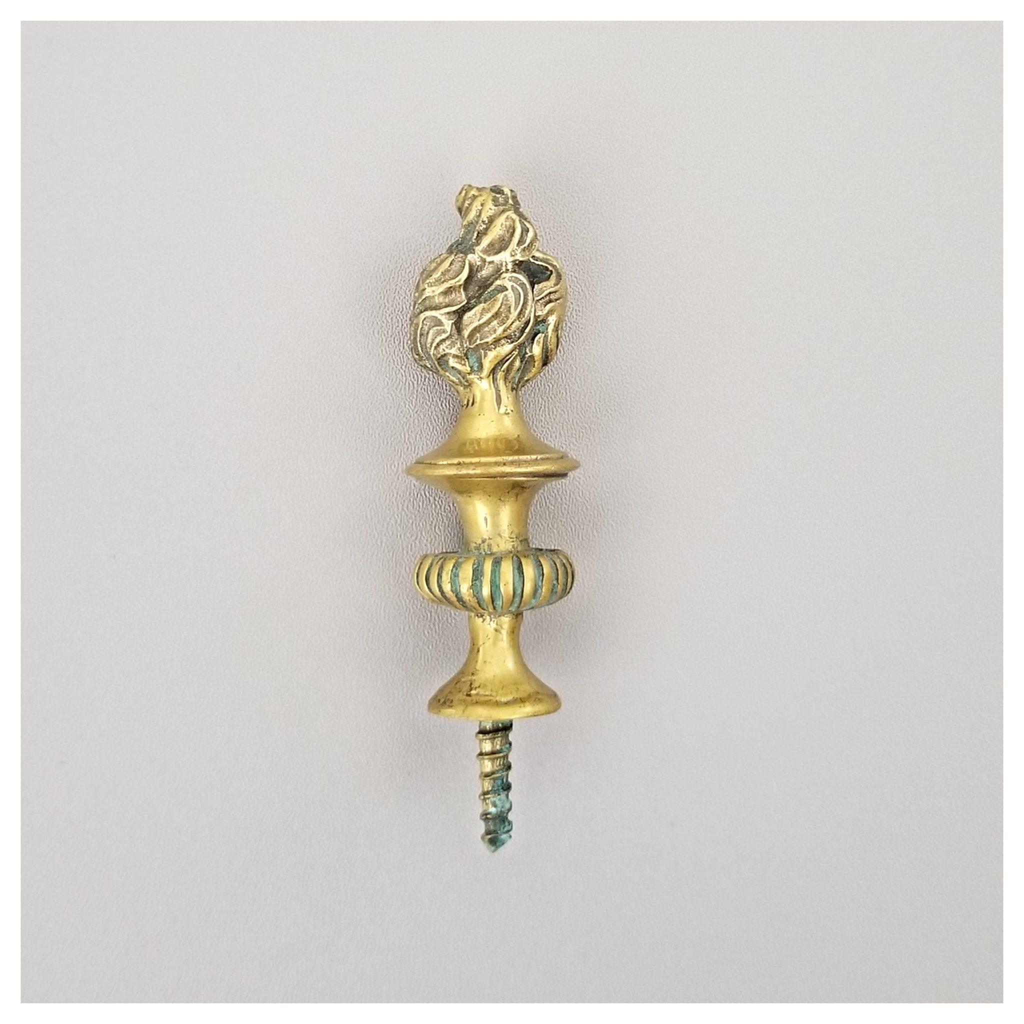 Brass capitals, clock parts and finials